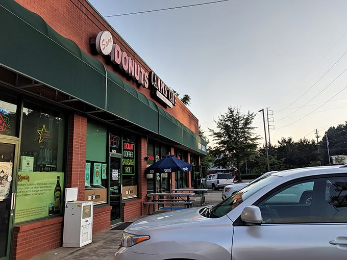 Sara Donuts' unassuming strip mall facade is like Clark Kent's glasses &ndash; hiding superhero-level pastry powers behind that modest green awning.