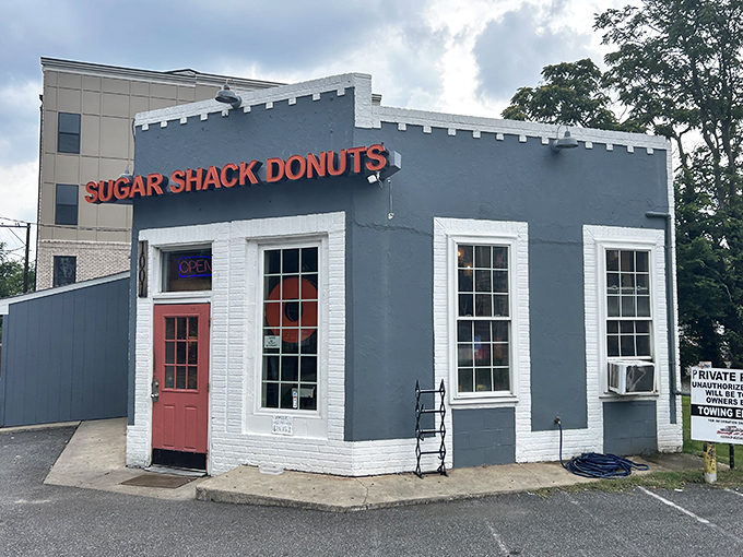 The blue-gray exterior with that coral door isn't just inviting&mdash;it's practically a siren song for your sweet tooth. Richmond's donut paradise awaits. 