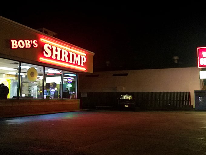 The glowing red sign of Bob's Shrimp stands out like a beacon for seafood lovers, promising simple pleasures in an unassuming package.