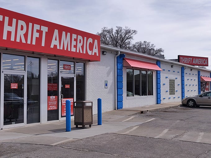 The bold red sign beckons like a siren call to treasure hunters. Thrift America's unassuming exterior hides a wonderland of vintage finds within.