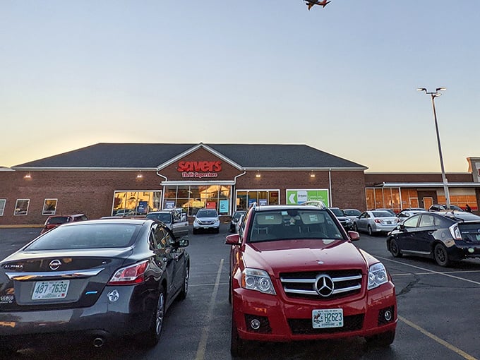 The iconic red Savers sign beckons like a lighthouse for bargain hunters, promising treasures within those brick walls that would make any thrift enthusiast's heart skip a beat.