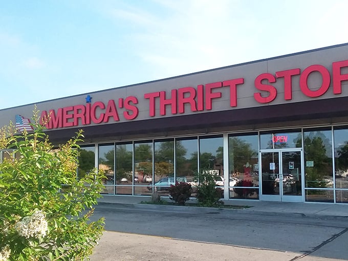 The red, white, and blue facade of America's Thrift Stores stands like a patriotic monument to bargain hunting. Treasure awaits inside!