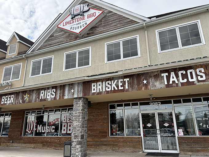 The rustic wooden fa&ccedil;ade boldly announces its priorities: RIBS, BRISKET, TACOS. No false advertising here&mdash;just a promise of smoky delights within. 