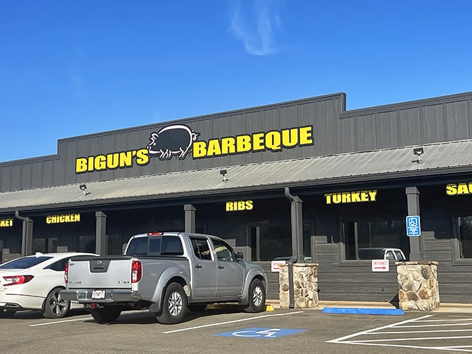 The rustic wooden exterior with bold yellow signage announces its purpose without pretense &ndash; this is barbecue country, and Bigun's means business.