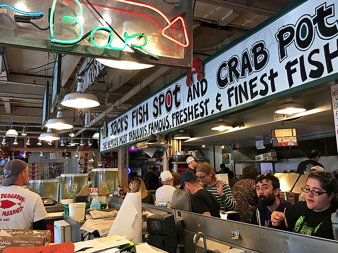 The bold claim of "World's Most Fabulous" might seem audacious until you taste what's behind that counter. Pike Place's seafood sanctuary awaits. 