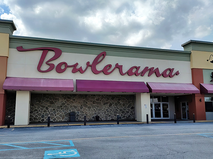 That iconic red neon sign glowing against the dusk sky isn't just advertising bowling&mdash;it's broadcasting a portal back to simpler times.