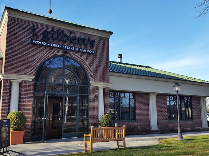 The brick facade of J. Gilbert's stands like a sentry guarding culinary treasures, its arched entrance beckoning hungry pilgrims to the promised land of prime rib.