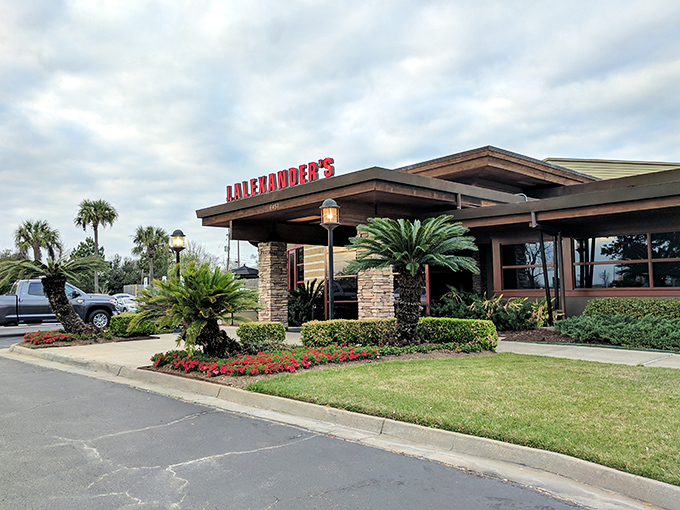 The iconic red lettering against stone and wood welcomes you like an old friend. Palm trees add that distinctive Louisiana touch to J. Alexander's inviting entrance.