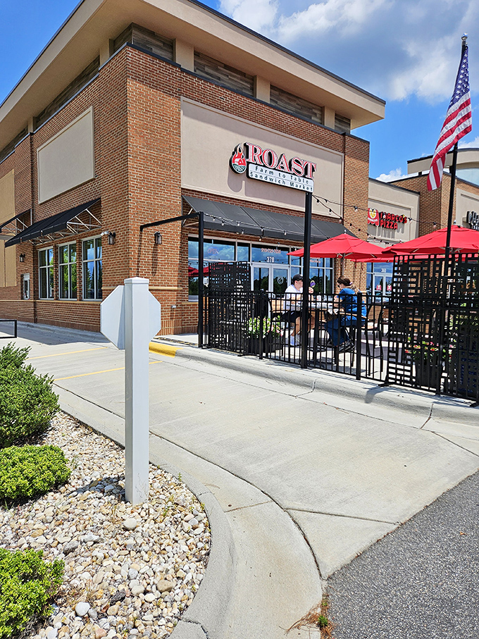 Roast's inviting brick fa&ccedil;ade with cheerful red umbrellas isn't just curb appeal &ndash; it's your first hint that sandwich nirvana awaits inside.