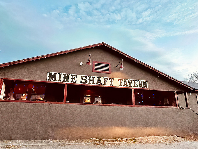 The unassuming exterior of Mine Shaft Tavern belies the culinary treasures within. Like finding a diamond in the desert, this Madrid landmark beckons hungry travelers.