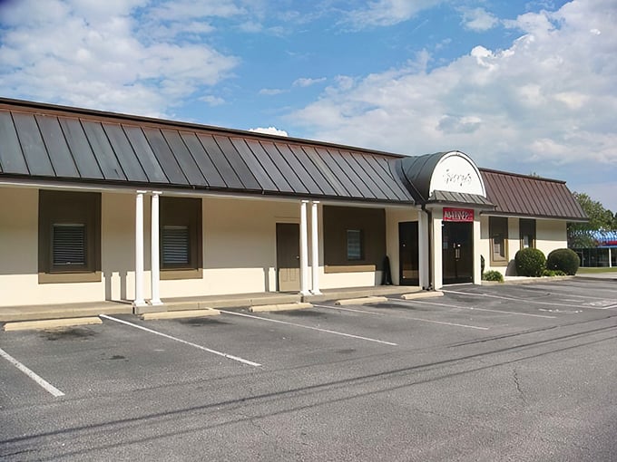 The unassuming exterior of George's Steak House proves once again that culinary greatness often hides behind modest facades. Suffolk's worst-kept secret awaits.