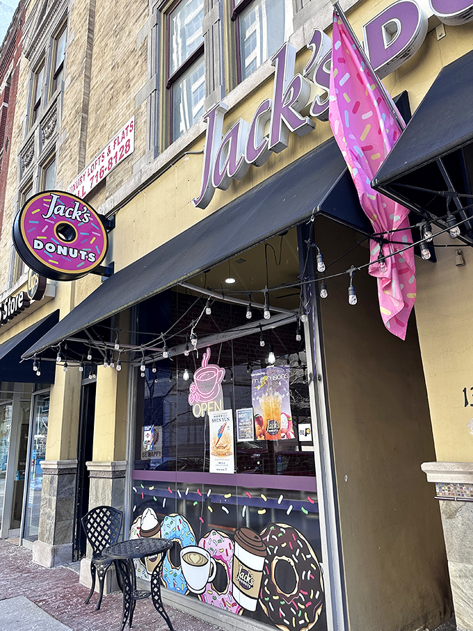 Jack's Donuts announces its presence with charming simplicity&mdash;a yellow brick building, black awning, and the promise of sweet satisfaction waiting inside. 