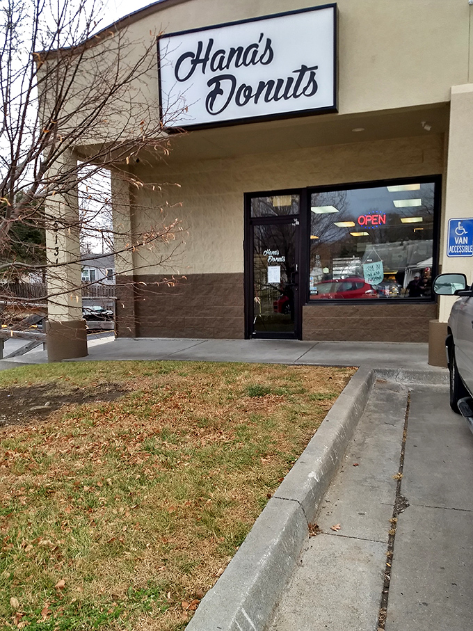 The unassuming storefront that houses Kansas City's donut nirvana. Like finding a treasure map in your attic, this sign promises delicious adventures ahead.