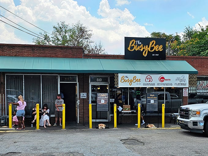 The iconic yellow and blue sign beckons like a lighthouse for hungry souls. Busy Bee has been Atlanta's fried chicken sanctuary since 1947.