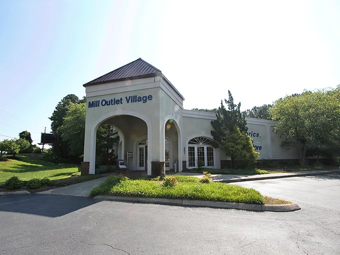 The inviting arched entrance of Mill Outlet Village promises fabric treasures within, like the wardrobe to Narnia for crafters.