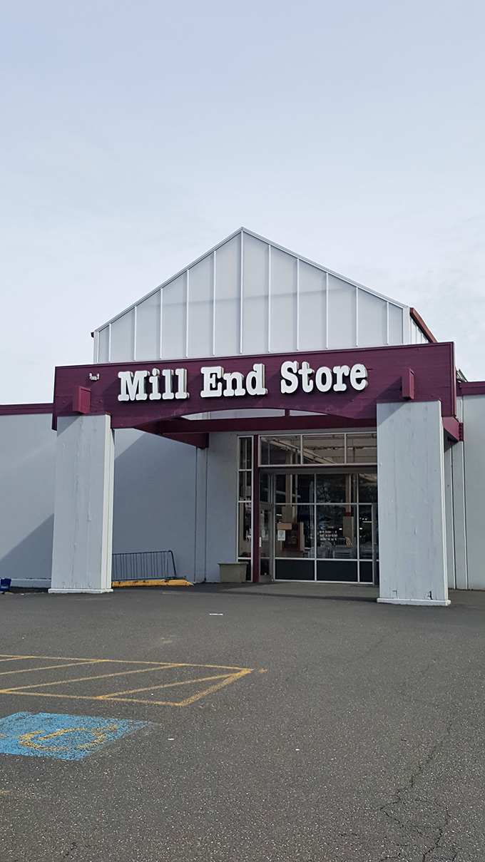 The unassuming exterior of Mill End Store belies the fabric wonderland within, like a textile TARDIS waiting to expand your creative universe.