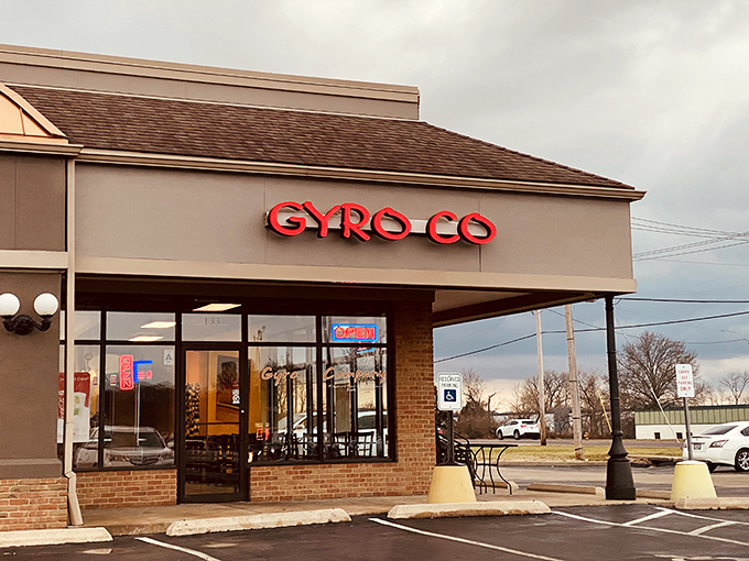 The unassuming brick storefront that houses culinary greatness. Like Superman's phone booth, this modest exterior disguises extraordinary powers within.