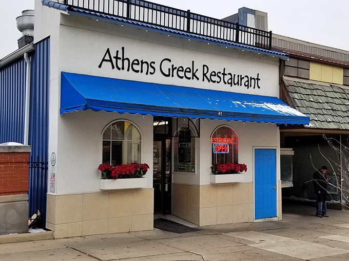 The blue-and-white fa&ccedil;ade of Athena Greek Restaurant stands like a Mediterranean oasis in downtown Mansfield, promising authentic flavors and hometown hospitality.