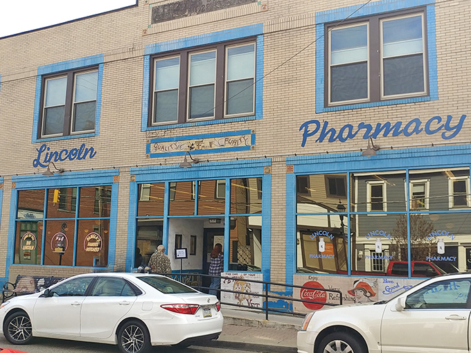 The iconic blue-trimmed exterior of Lincoln's P&G Diner stands as a beacon of breakfast hope in Bellevue. Time to eat, indeed! 