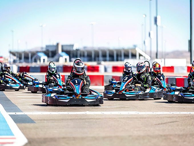 Ready, set, speed! These sleek blue and black karts aren't your childhood bumper cars&mdash;they're miniature Formula 1 dreams waiting to be unleashed.