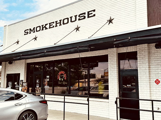 The white-brick exterior of 4 Rivers Smokehouse stands like a beacon of barbecue hope in Winter Park, promising smoky salvation within those unassuming walls.