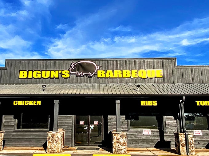 The rustic wooden exterior with bold yellow signage announces its purpose without pretense &ndash; this is barbecue country, and Bigun's means business.