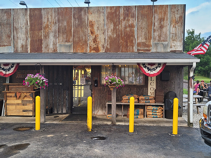 The weathered exterior of Rusted Silo isn't just authentic&mdash;it's a time machine disguised as a barbecue joint. Those yellow posts aren't just practical; they're exclamation points announcing culinary treasure.