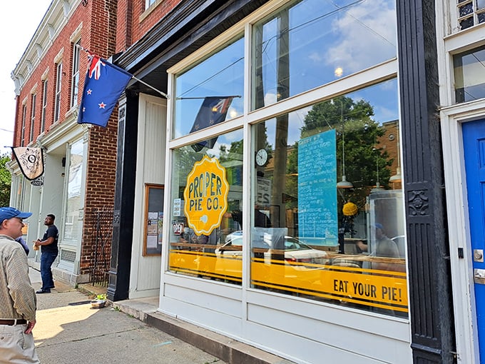 The iconic blue door and bright yellow logo of Proper Pie Co. stand out like a beacon for pastry pilgrims on Richmond's East Broad Street.