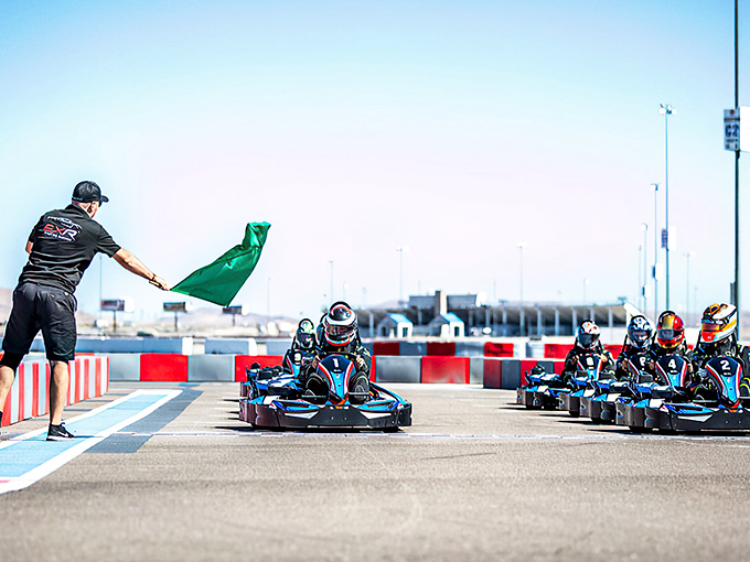 Ready, set, speed! These sleek blue and black karts aren't your childhood bumper cars&mdash;they're miniature Formula 1 dreams waiting to be unleashed.