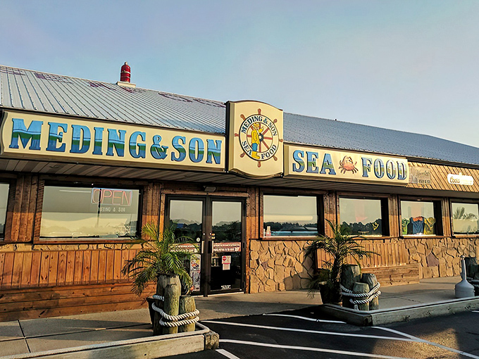 The unassuming exterior of Meding's Seafood stands like a siren call to hungry travelers. No fancy frills, just the promise of seafood treasures within.