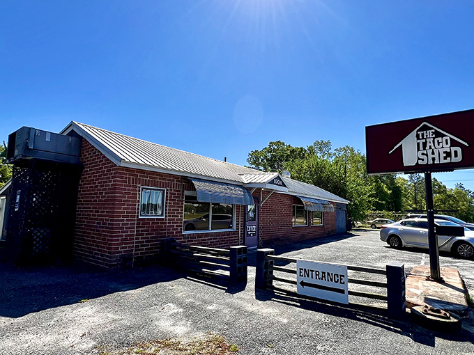 Morning sunshine meets brick-and-mortar simplicity at The Taco Shed. This unassuming Warner Robins landmark proves great breakfasts don't need fancy facades.