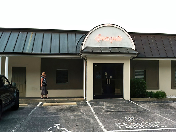 The unassuming exterior of George's Steak House proves once again that culinary greatness often hides behind modest facades. Suffolk's worst-kept secret awaits.