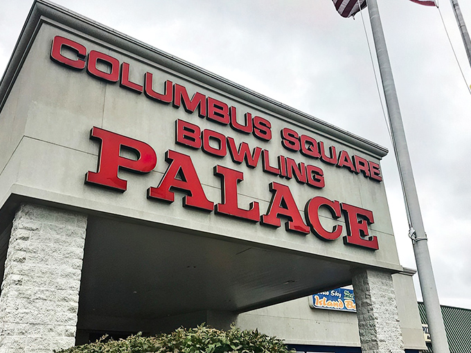 That iconic red signage beckons like a neon-lit promise of strikes, spares, and the occasional gutter ball adventure.