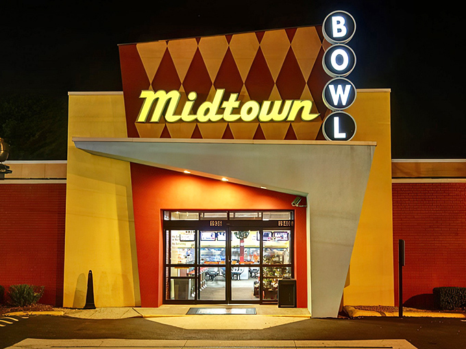 The mid-century facade of Midtown Bowl looks like it could star in its own Wes Anderson film - retro diamonds and all.