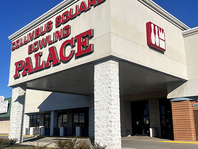 That iconic red signage beckons like a neon-lit promise of strikes, spares, and the occasional gutter ball adventure.