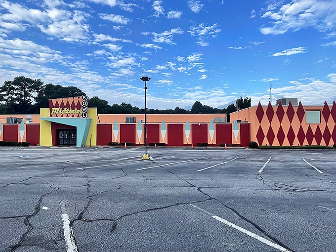 The mid-century facade of Midtown Bowl looks like it could star in its own Wes Anderson film - retro diamonds and all.
