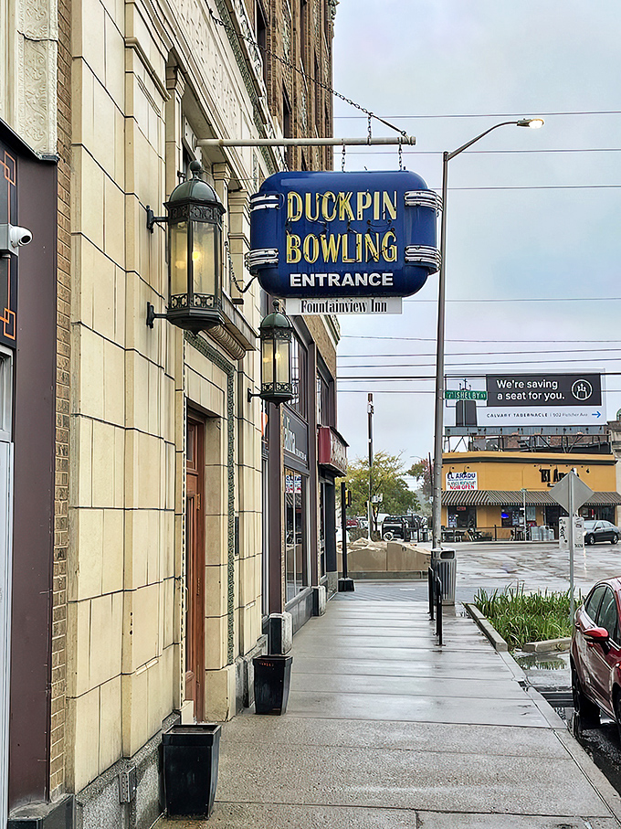 That blue neon sign beckons like a portal to another era&mdash;when entertainment moved at human speed and bowling had character.