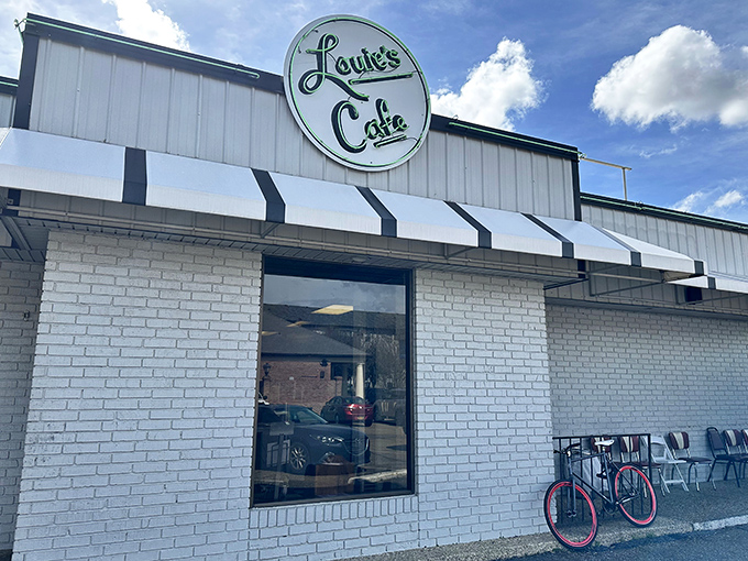 Louie's circular sign has beckoned hungry Baton Rouge residents since 1941—a beacon of breakfast hope against the Louisiana sky.