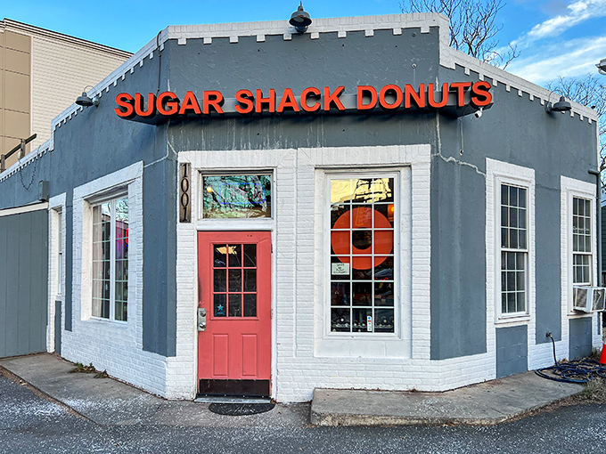The blue-gray exterior with that coral door isn't just inviting&mdash;it's practically a siren song for your sweet tooth. Richmond's donut paradise awaits. 