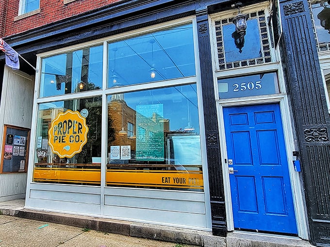 The iconic blue door and bright yellow logo of Proper Pie Co. stand out like a beacon for pastry pilgrims on Richmond's East Broad Street.