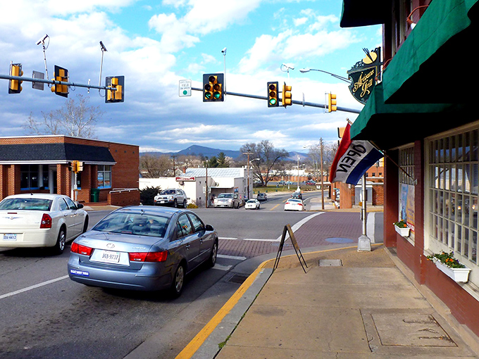 Downtown Luray greets visitors with small-town charm and big mountain views. Those Blue Ridge silhouettes in the background aren't CGI—they're your everyday spectacular reality here.