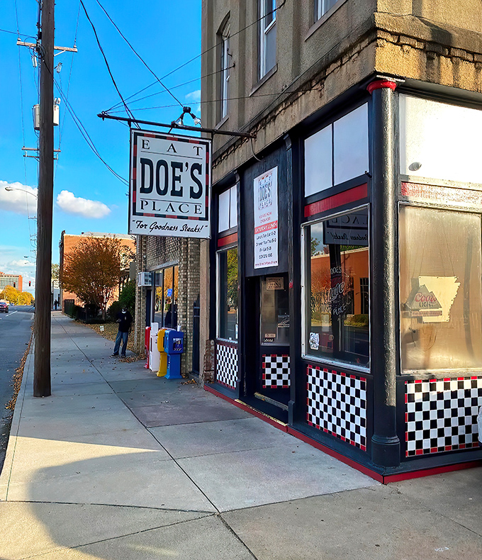 The unassuming exterior of Doe's Eat Place hides culinary greatness within, like finding a diamond in your backyard. That yellow truck knows what's up!