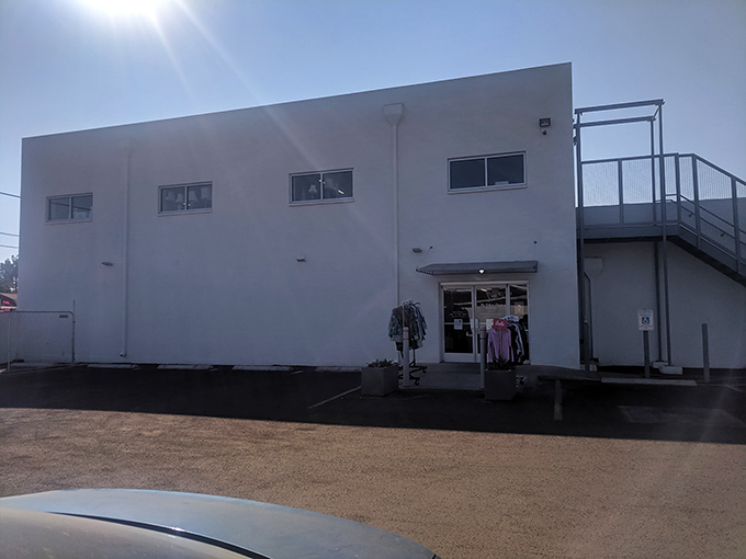 The blue and white exterior of White Dove stands like a beacon of bargain hope on Indian School Road, promising treasures within.