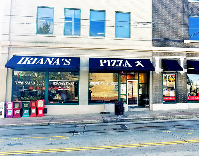 The unassuming storefront of Iriana's Pizza stands like a beacon of hope for hungry downtown Little Rock wanderers. Simple green frames, bold red sign&mdash;pizza paradise awaits.