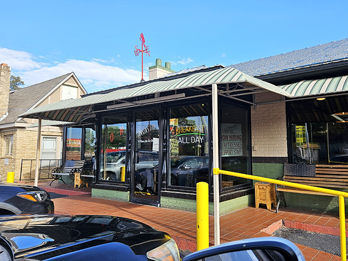 The parking sign says it all &ndash; this isn't just a meal, it's a destination worth navigating to. Benson's Grill beckons hungry travelers under clear Arkansas skies.