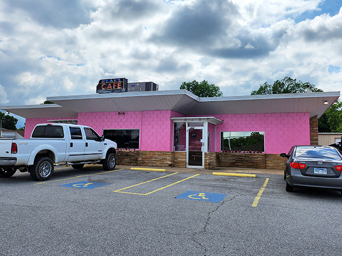 That pink exterior isn't just a building&mdash;it's a beacon of hope for hungry travelers seeking Southern comfort on a plate.