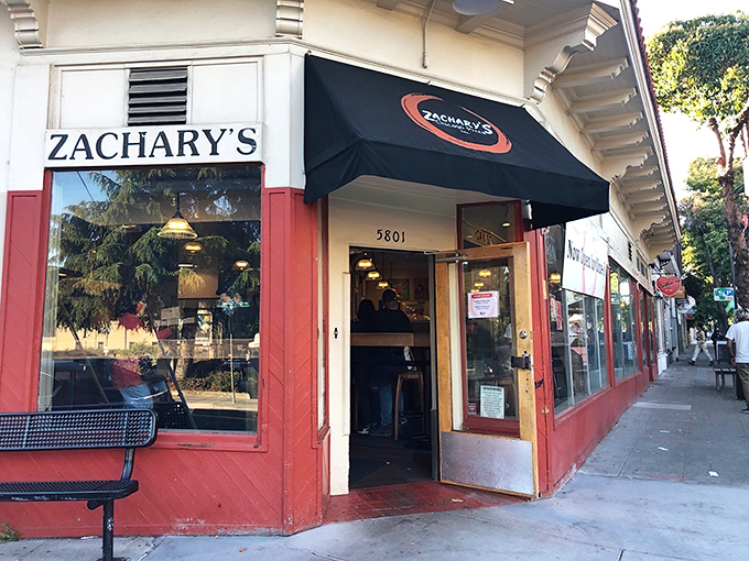 The corner storefront that launched a thousand cravings. Zachary's iconic Rockridge location glows like a beacon for pizza pilgrims after dark.