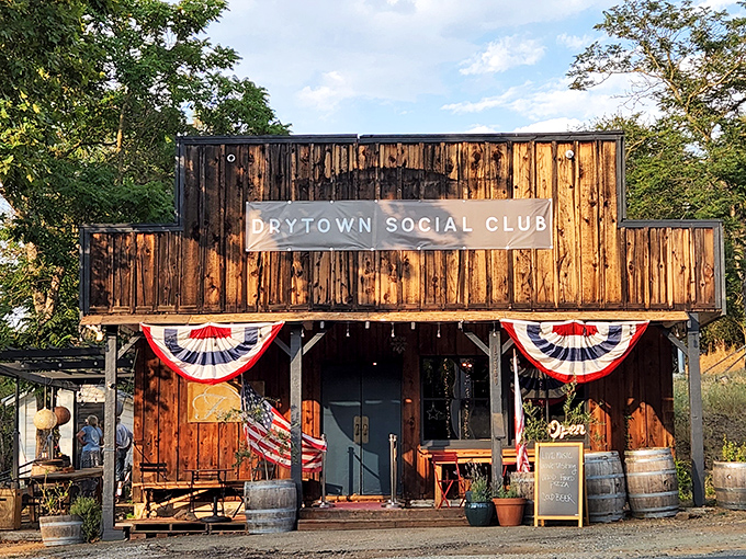 Nestled among towering pines, Giant Burger's charming A-frame structure stands as a beacon of hope for the hungry traveler. That wooden bear knows what's up.