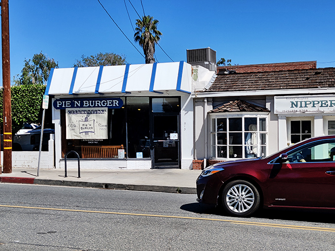 The unassuming white and blue exterior of Pie 'n Burger stands like a time capsule on Pasadena's California Boulevard, promising honest food without the fanfare.