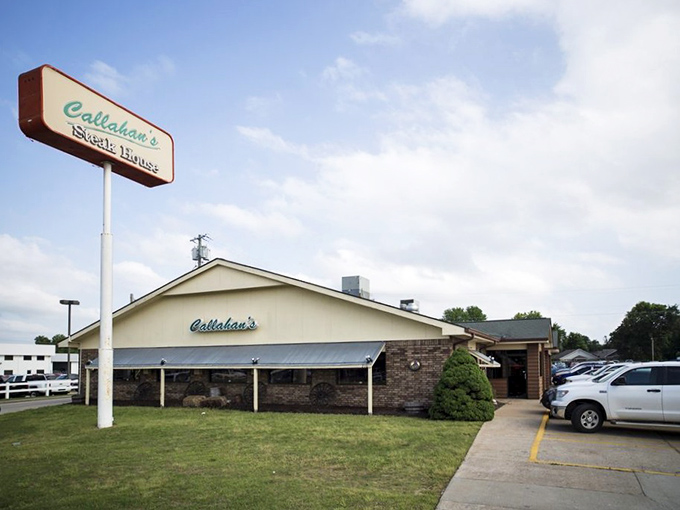 The unassuming exterior of Callahan's Steak House stands like a humble guardian of grilling secrets. No fancy frills, just the promise of carnivorous delight within.